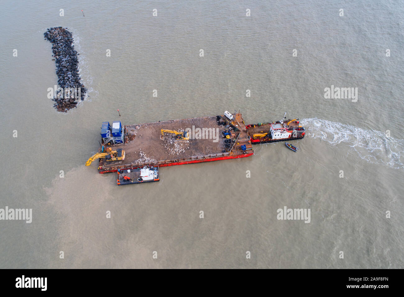 Barge With Rock High Resolution Stock Photography and Images - Alamy