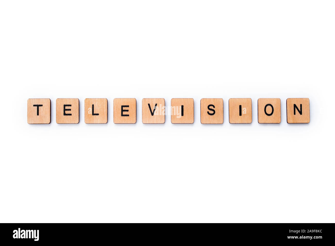 The word Television, spelt with wooden letter tiles over a white ...