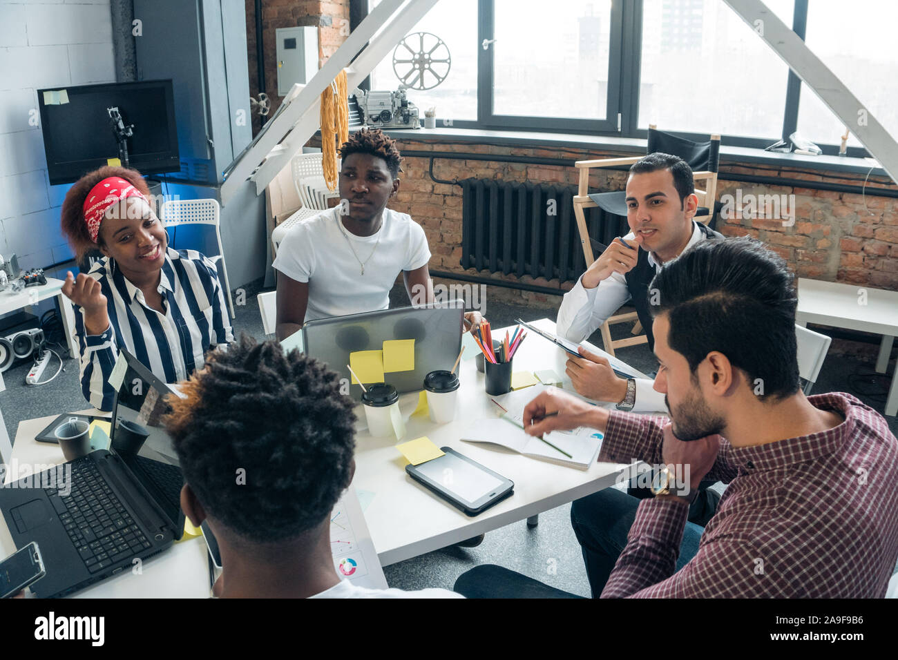 Old businessman talking colleague in hi-res stock photography and ...