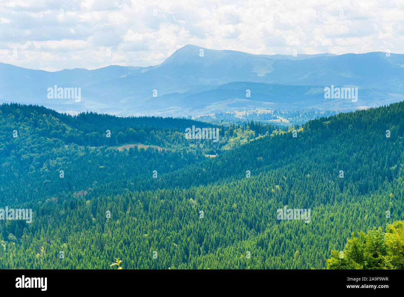 Few mountains at big distance between each other Stock Photo - Alamy