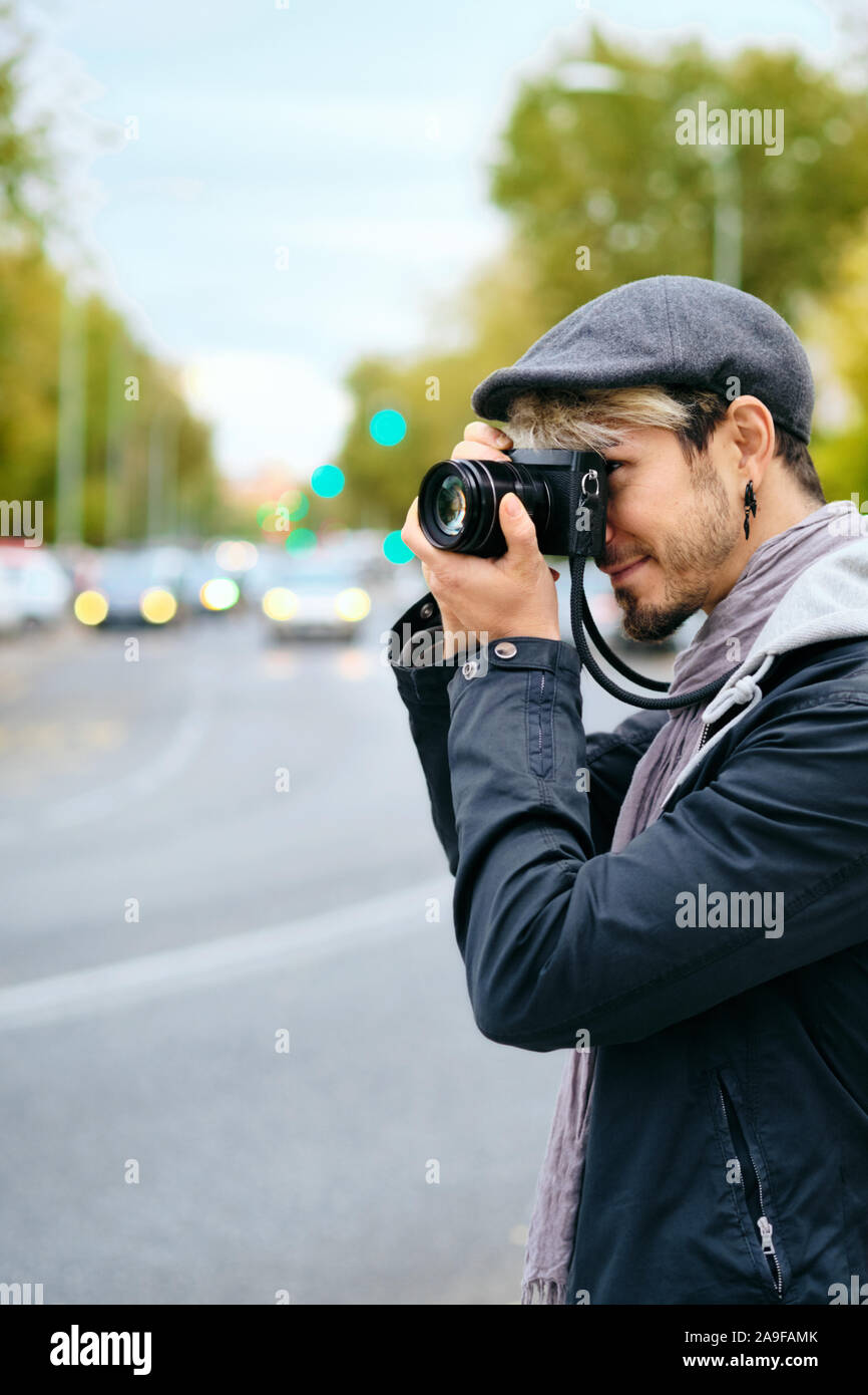 Hipster Photographer Taking Street Pictures With Mirrorless Camera ...