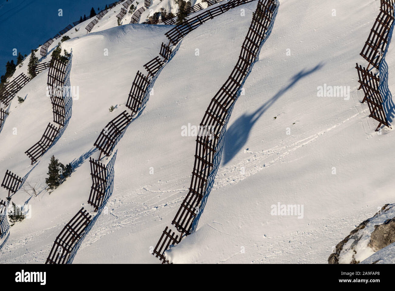 Avalanche barrier, snow Stock Photo - Alamy