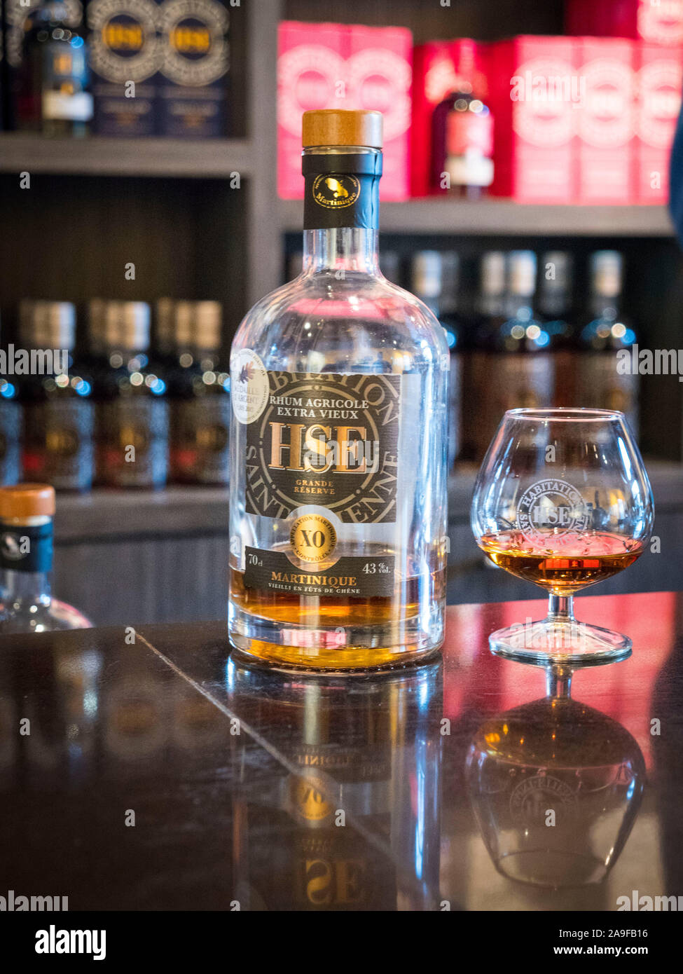 Rhum HSE, rum distillery, rum bottle, rum glass Stock Photo - Alamy