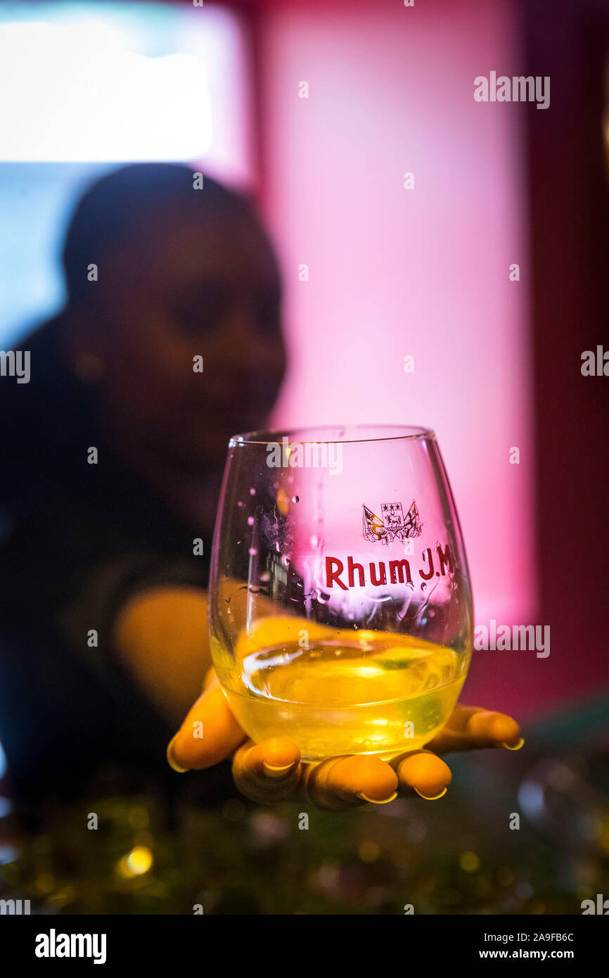 Rhum JM, distillation Rhum JM, tasting room for visitors, woman, hand ...