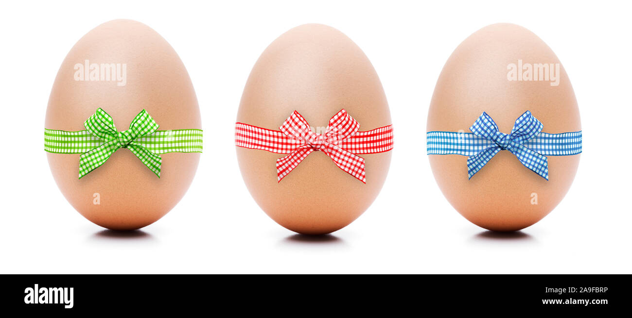 Eggs with a bow Stock Photo - Alamy