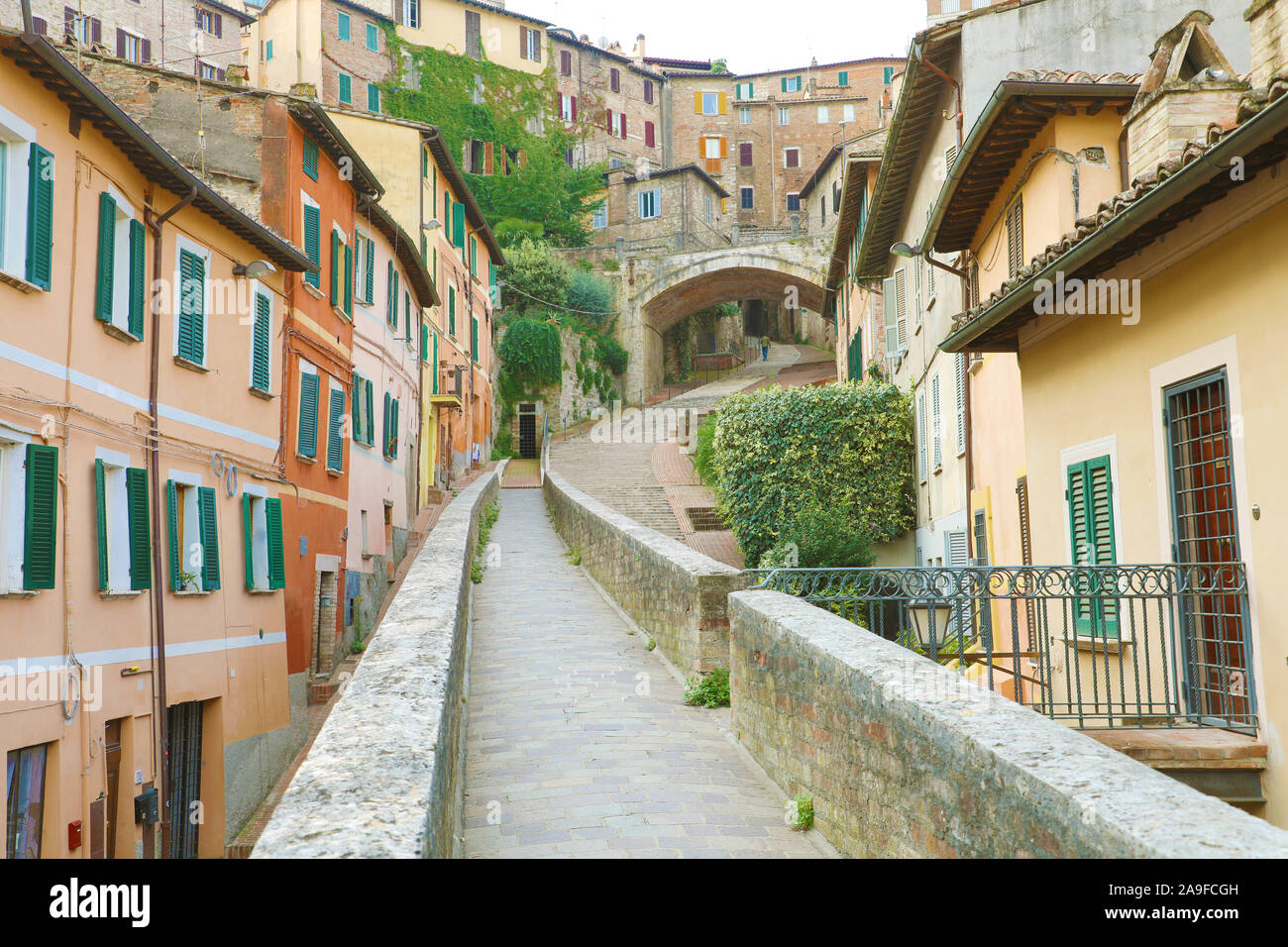 Perugia, Italy. Old medieval aqueduct and colorful buildings Stock ...