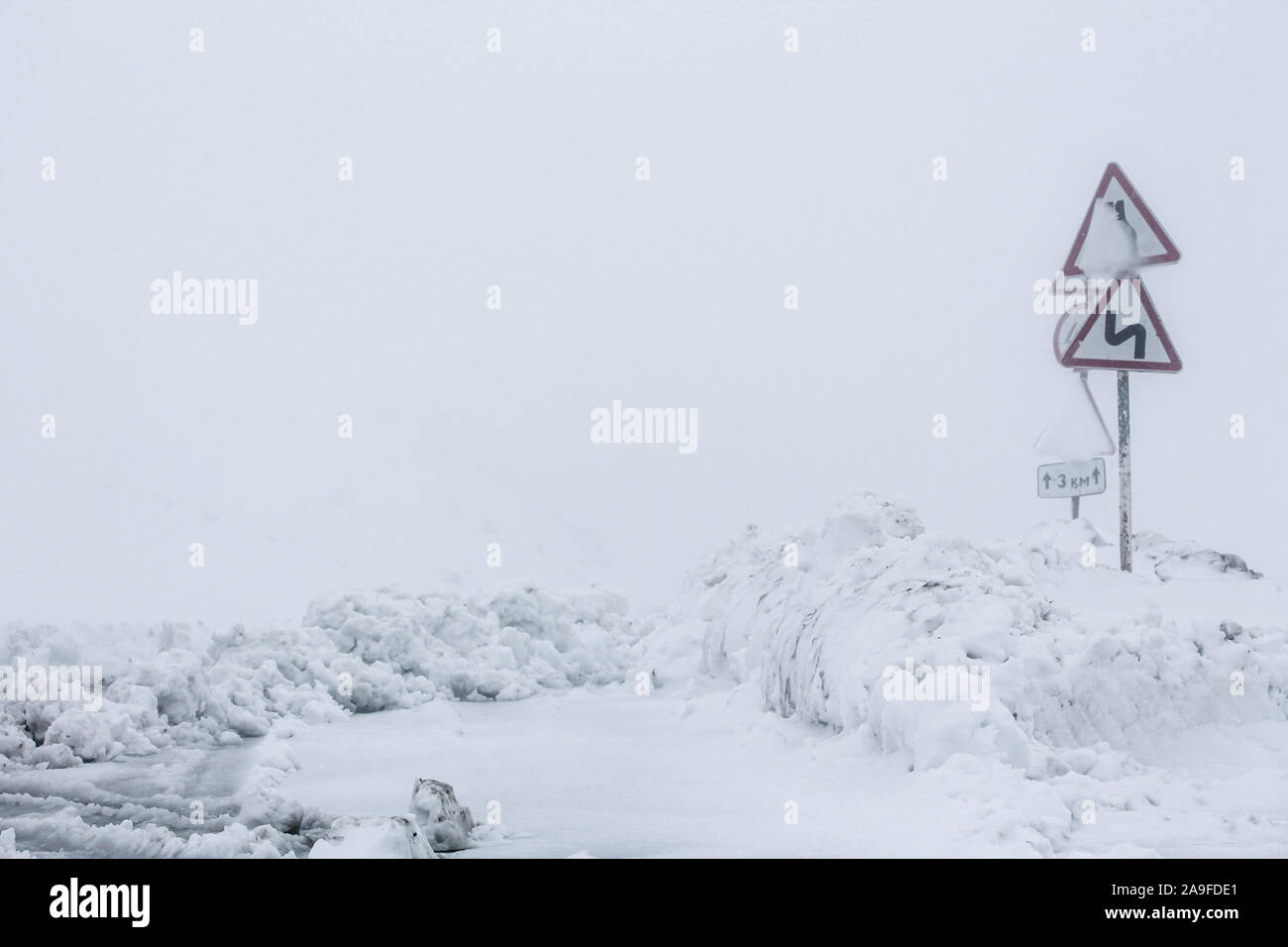 View on winter road during bad and extreme weather conditions. Blizzard ...
