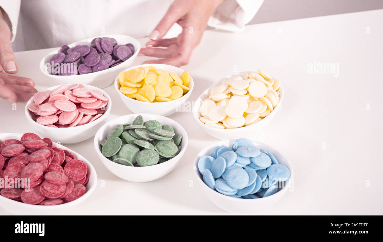 Color chocolate chips ready to be used in the recipe Stock Photo - Alamy