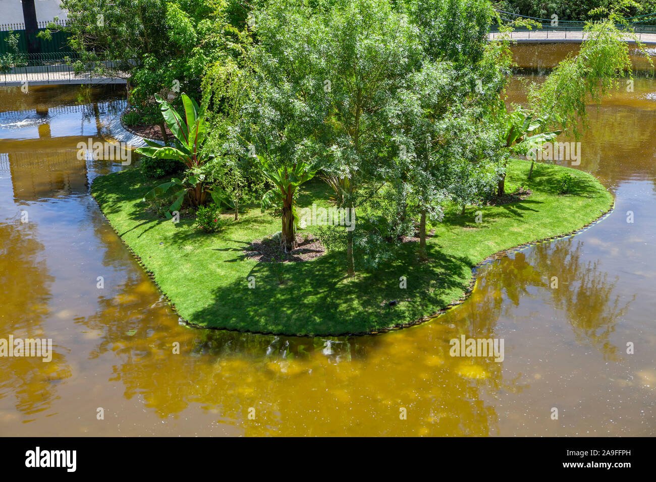 little green island with tropical plants Stock Photo - Alamy