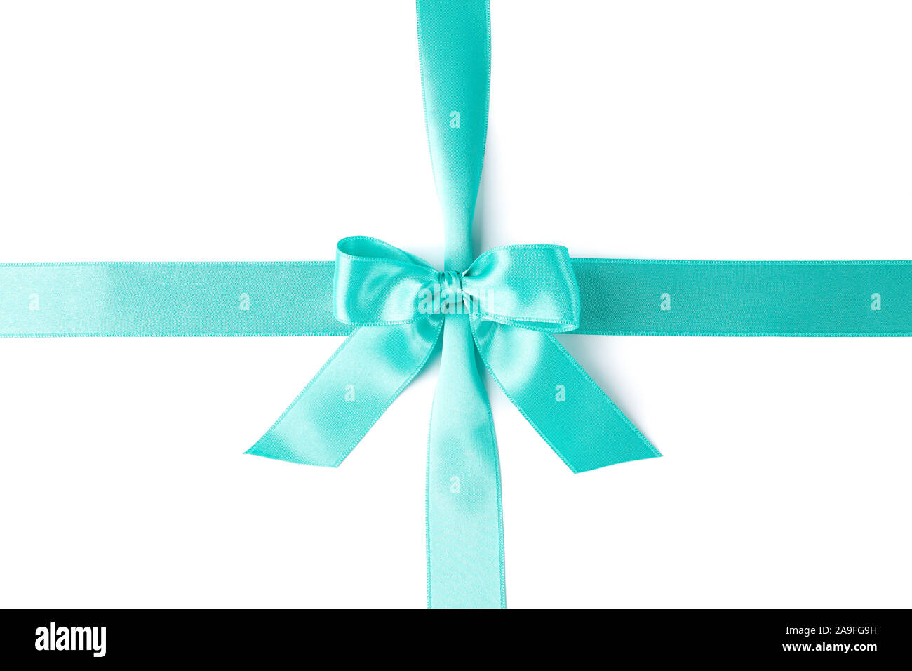 Turquoise ribbon with bow isolated on white background. Gift concept ...
