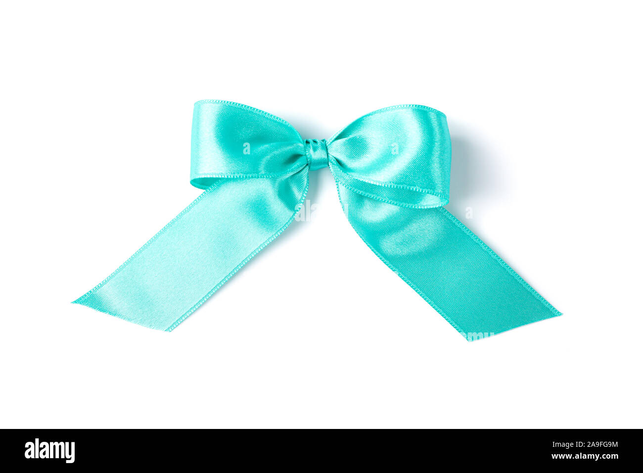Turquoise bow isolated on white background. Gift concept Stock Photo ...