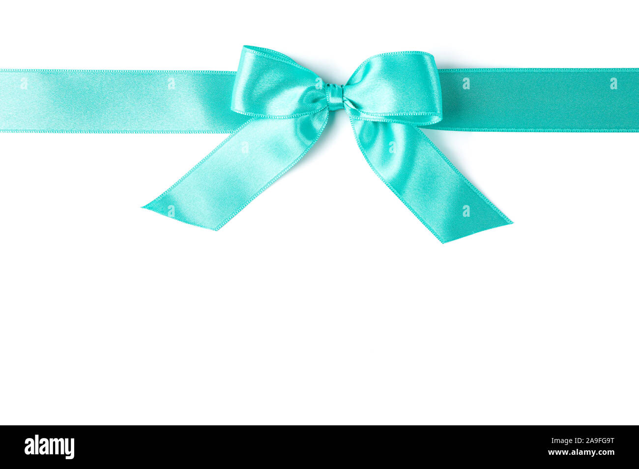 Turquoise ribbon with bow isolated on white background. Gift concept ...