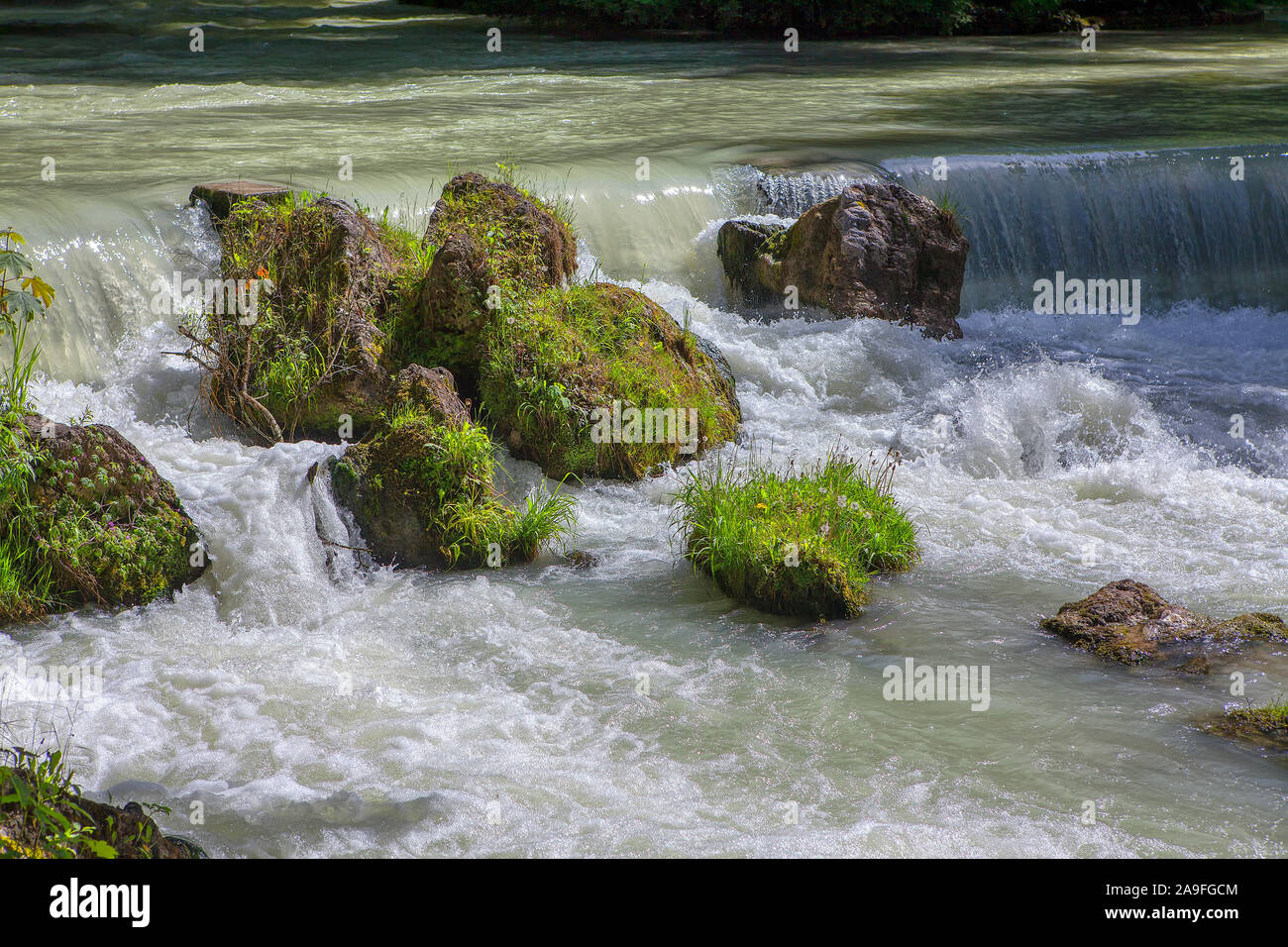 big natural rocks in waterfall Stock Photo - Alamy