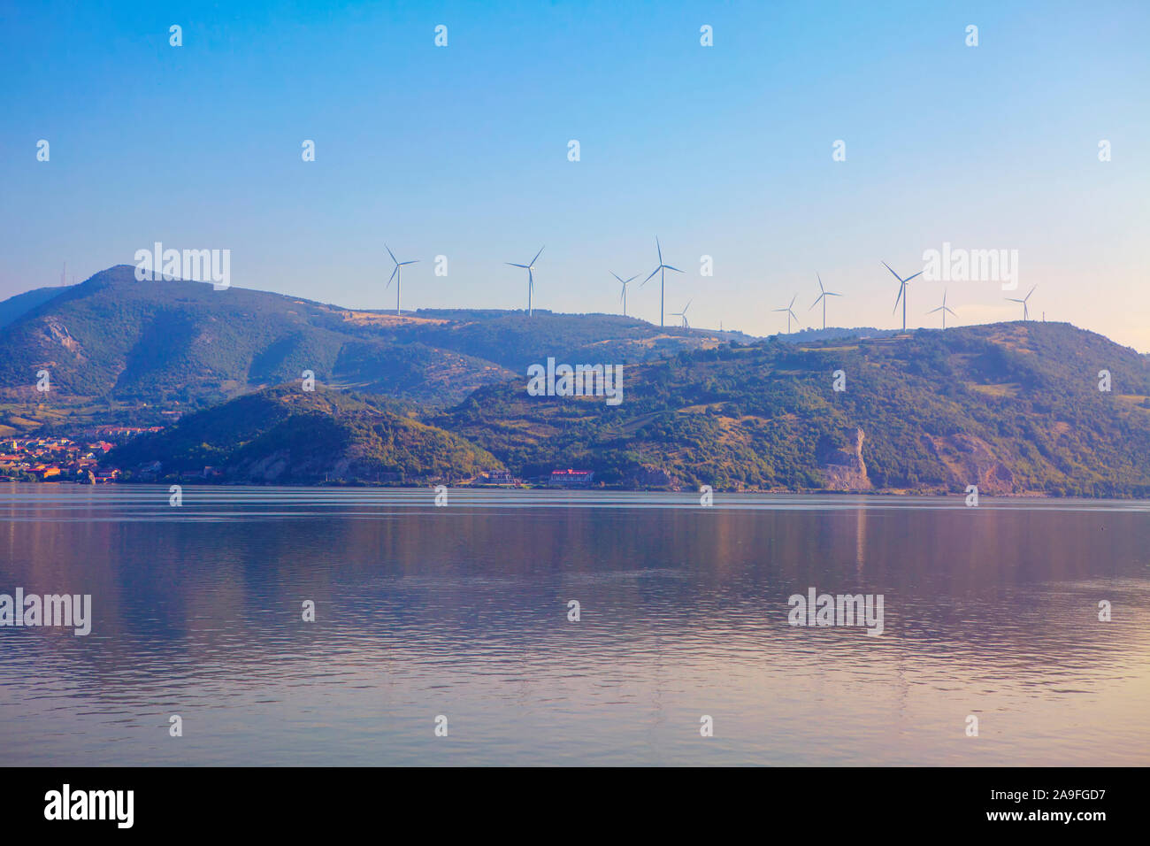 scenery with wind mills on the hills Stock Photo - Alamy