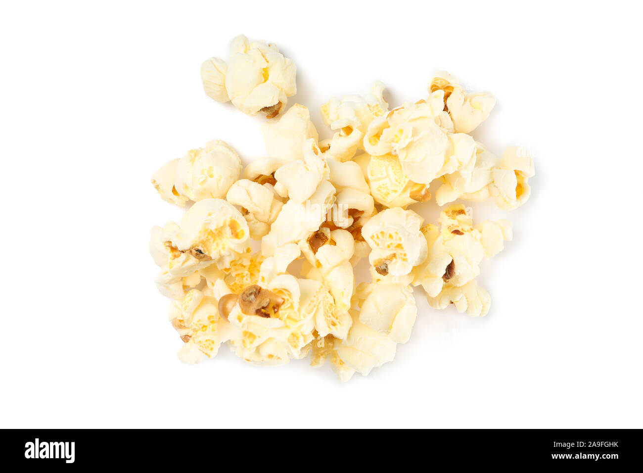 Popcorn pile isolated on white background, close up Stock Photo - Alamy