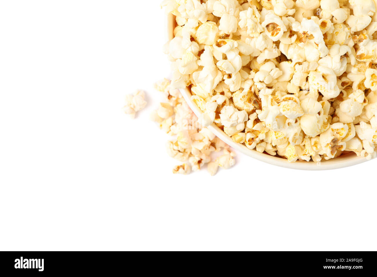 Bucket with popcorn isolated on white background, top view Stock Photo ...