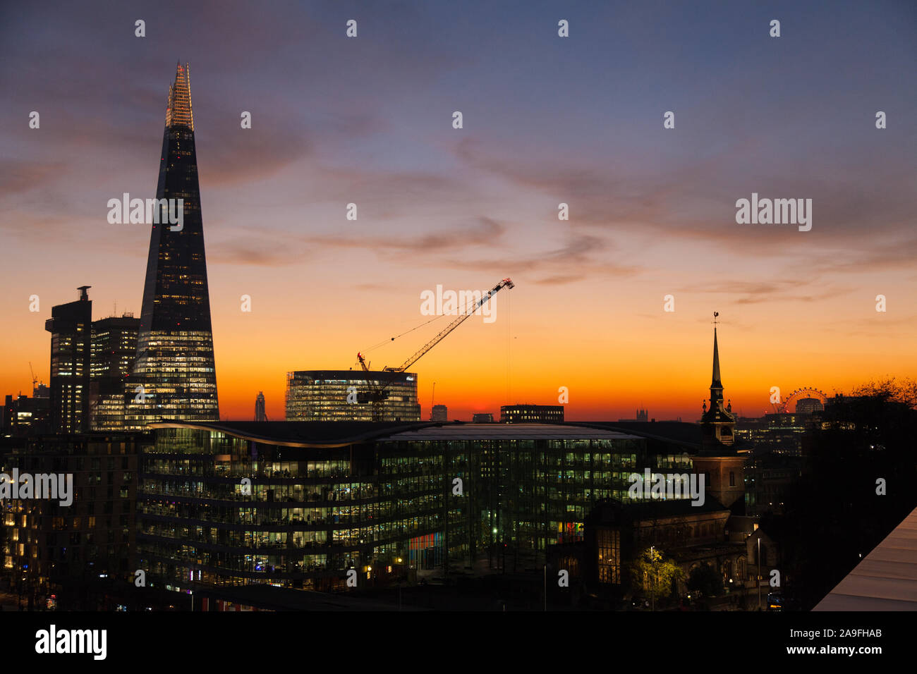 Winter sunset over the famous architecture of The Shard and London ...