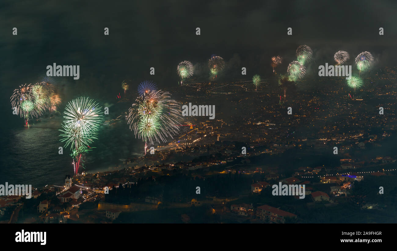 Madeira island celebrating the new year with fireworks over Funchal ...