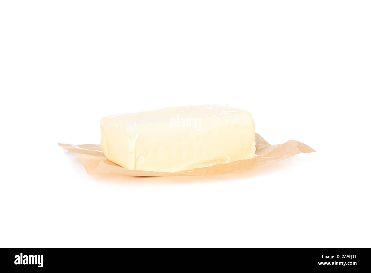Butter on baking paper isolated on white background Stock Photo - Alamy