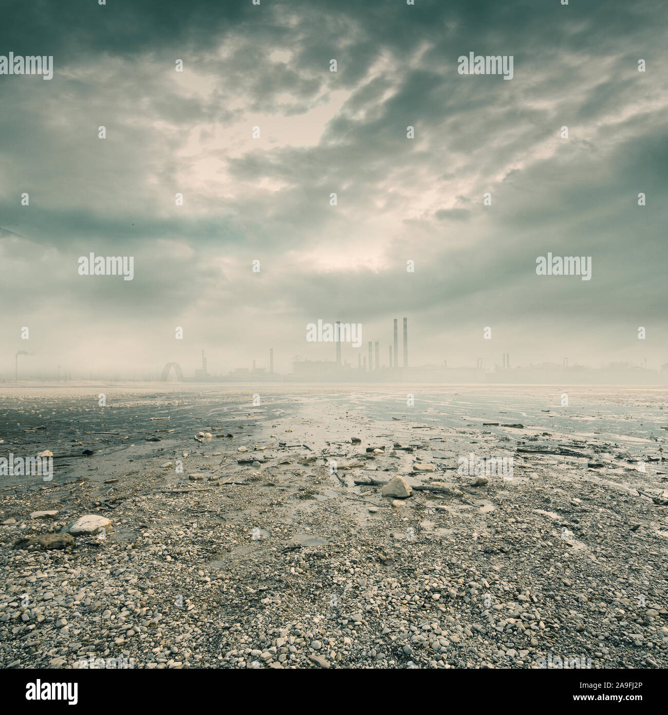 Dry contaminated environment with polluting industry and toxic gases in ...