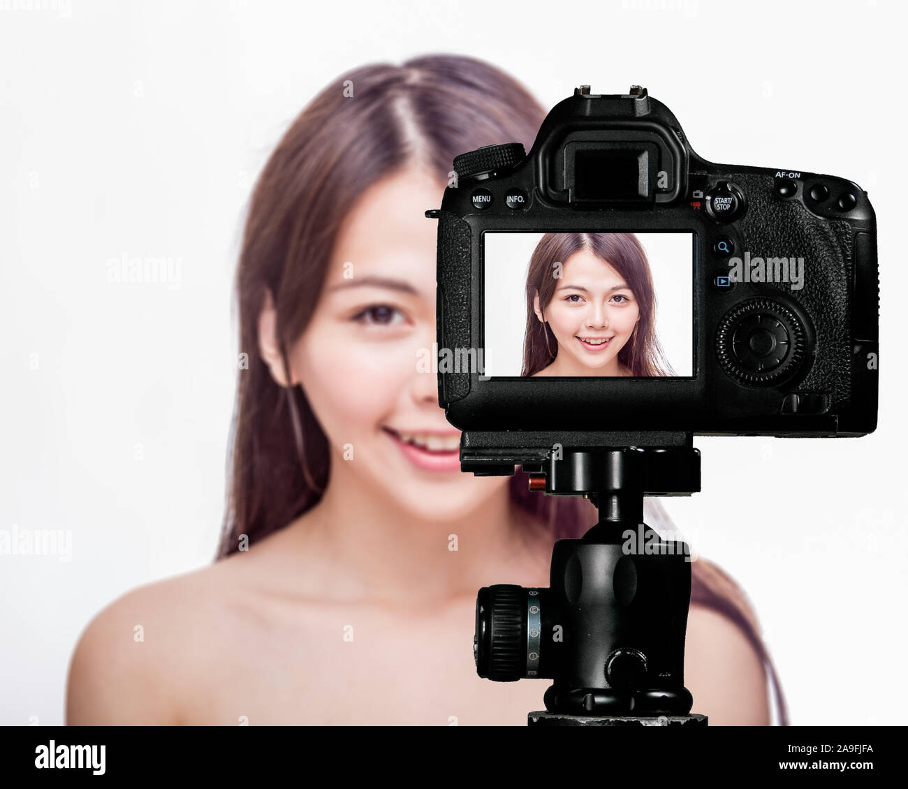 Asian American beauty vlogger creating content for social media vlog ...