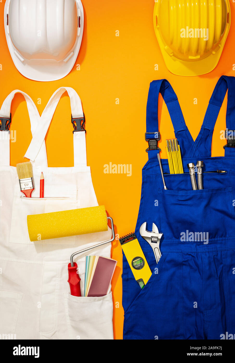 Repairman and painter work uniforms with tools and safety helmets, DIY ...