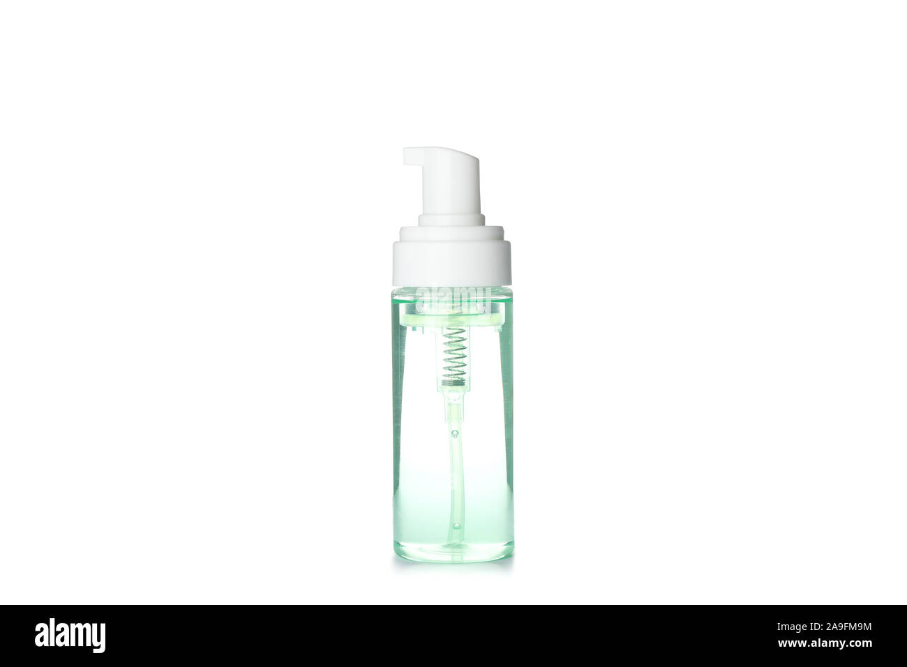 Liquid in spray bottle isolated on white background Stock Photo - Alamy
