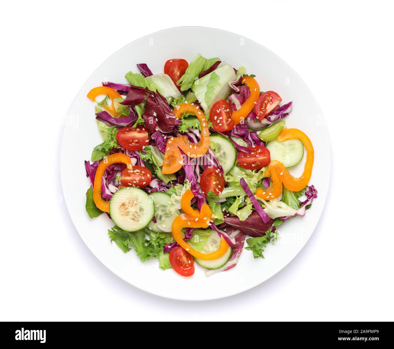 Plate with fresh salad isolated on white background Stock Photo - Alamy