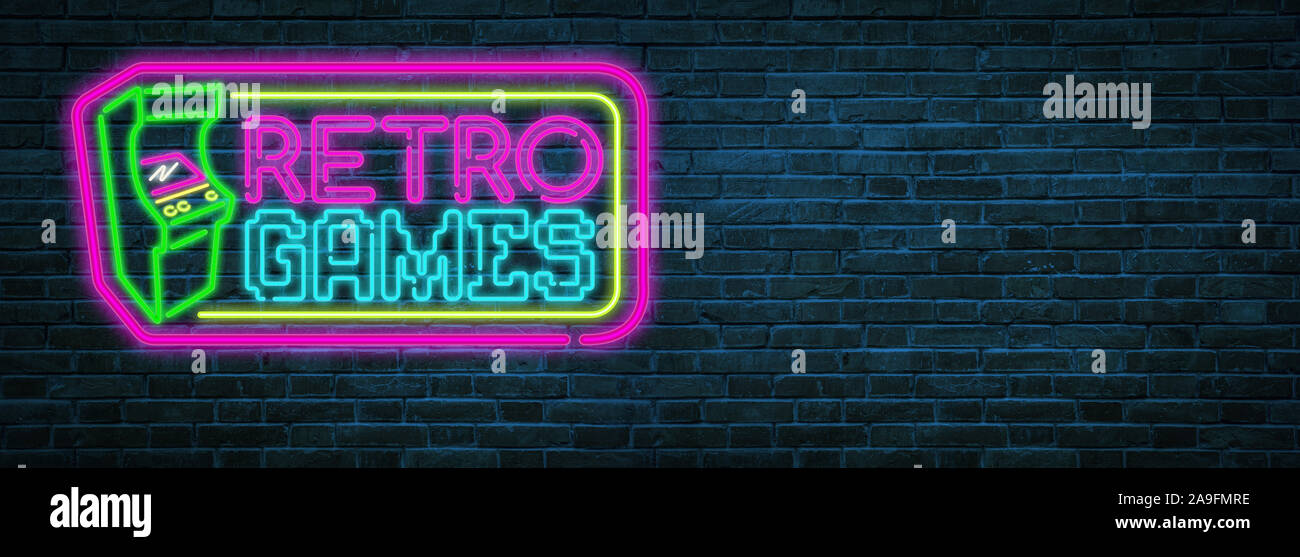 Retro games colorful neon sign with arcade videogame Stock Photo - Alamy