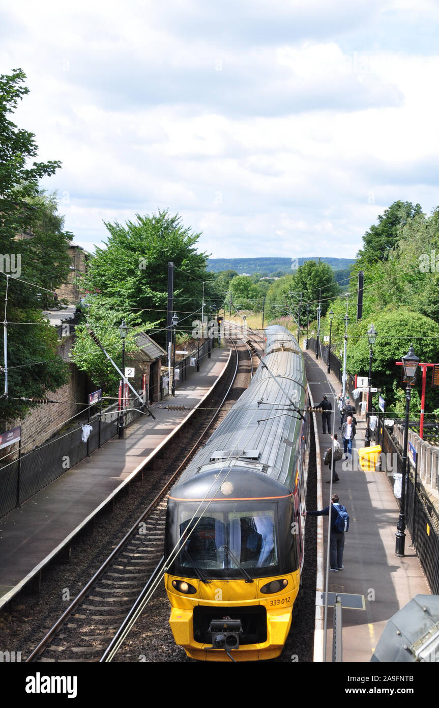 Electric train, Saltaire station, Yorkshire Stock Photo - Alamy
