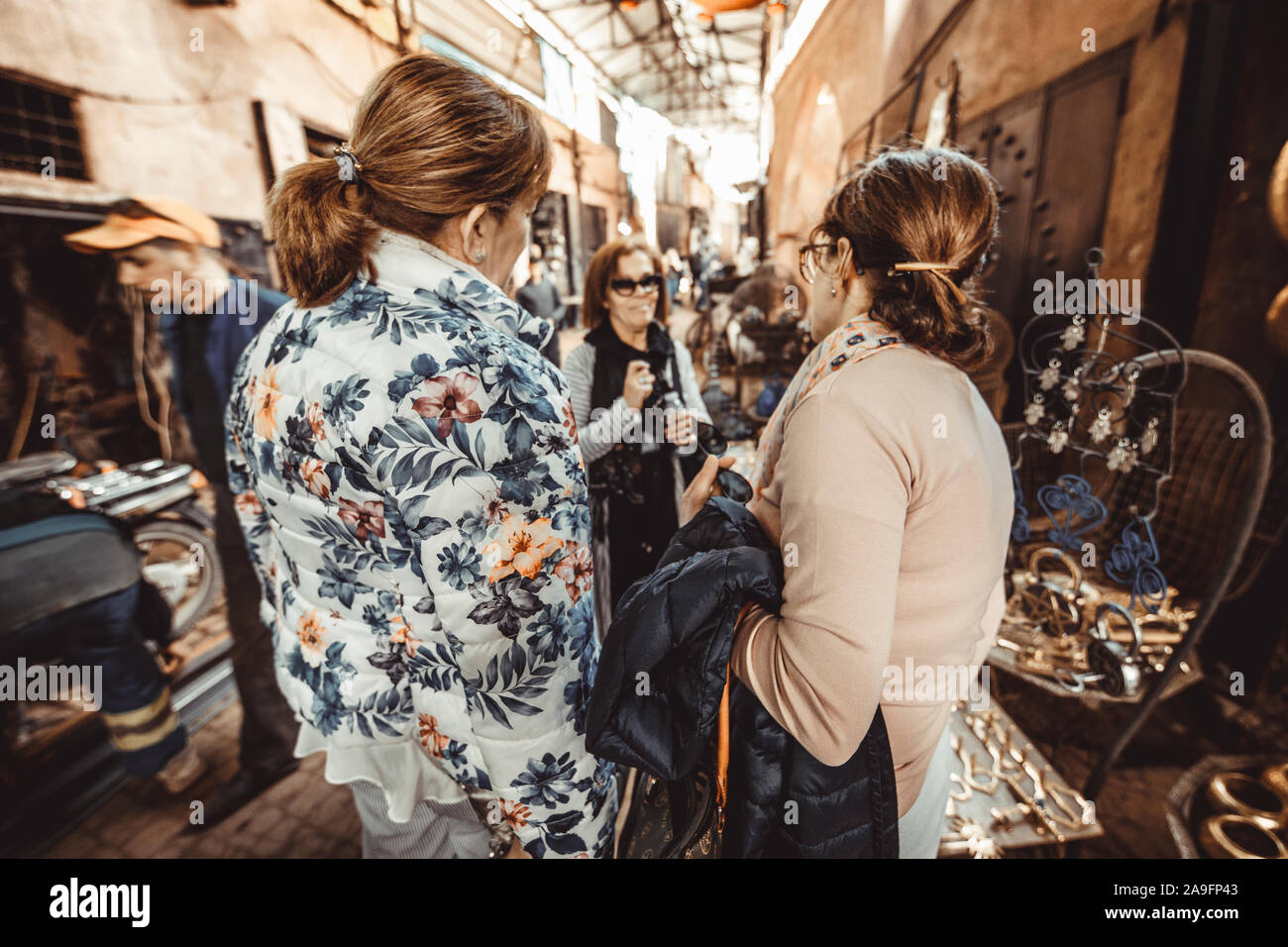 women negotiating in traditional market Stock Photo - Alamy