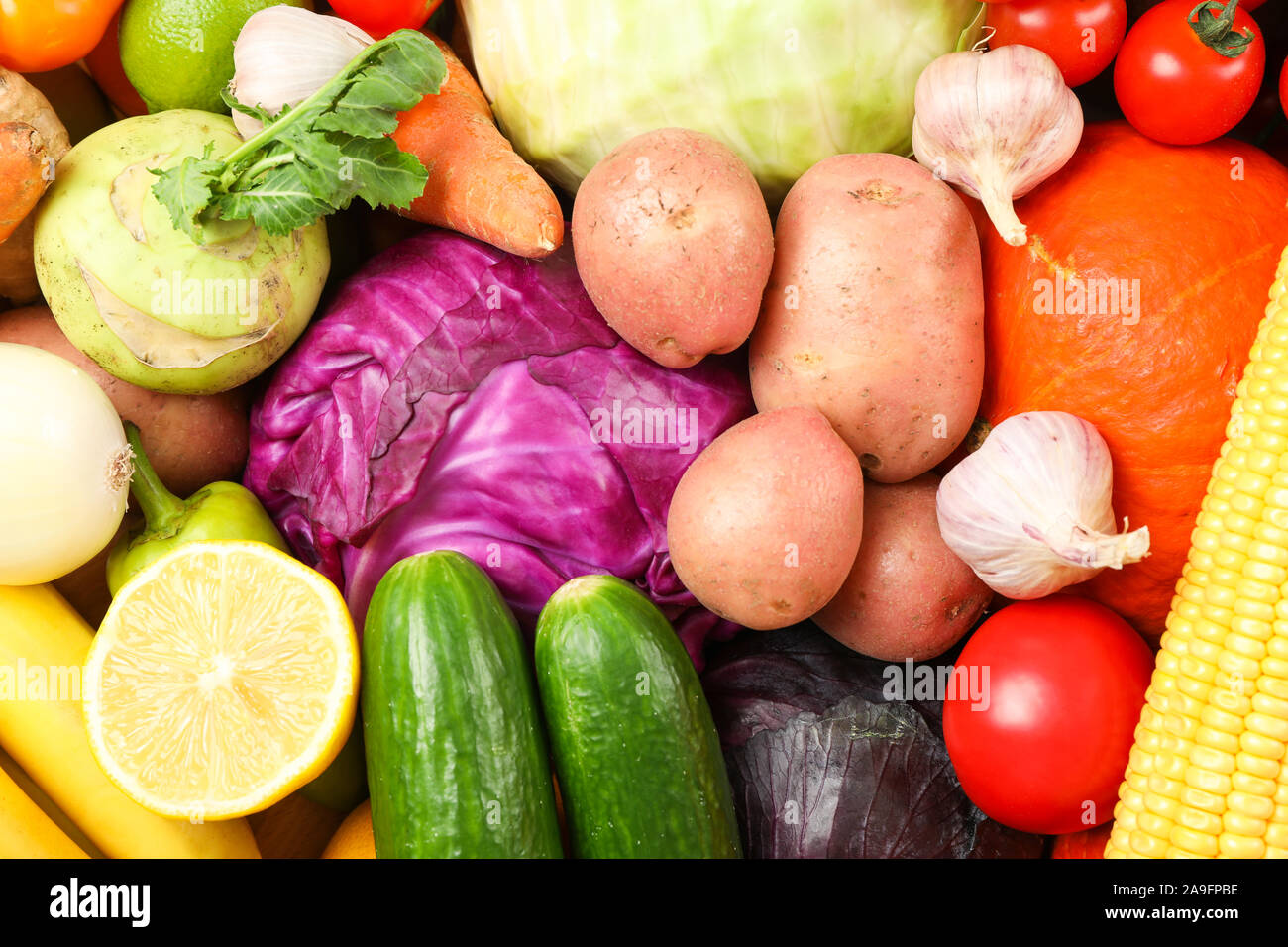 Vegetables and fruits texture on whole background, close up Stock Photo ...