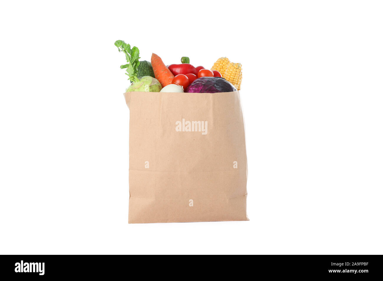 Paper bag with different vegetables isolated on white background Stock ...