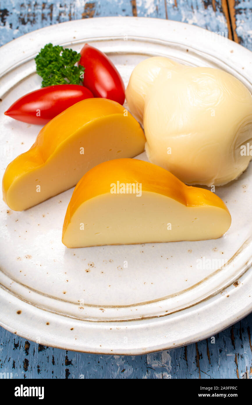 Cheese collection, white and smoked yellow italian scamorza cheese ...