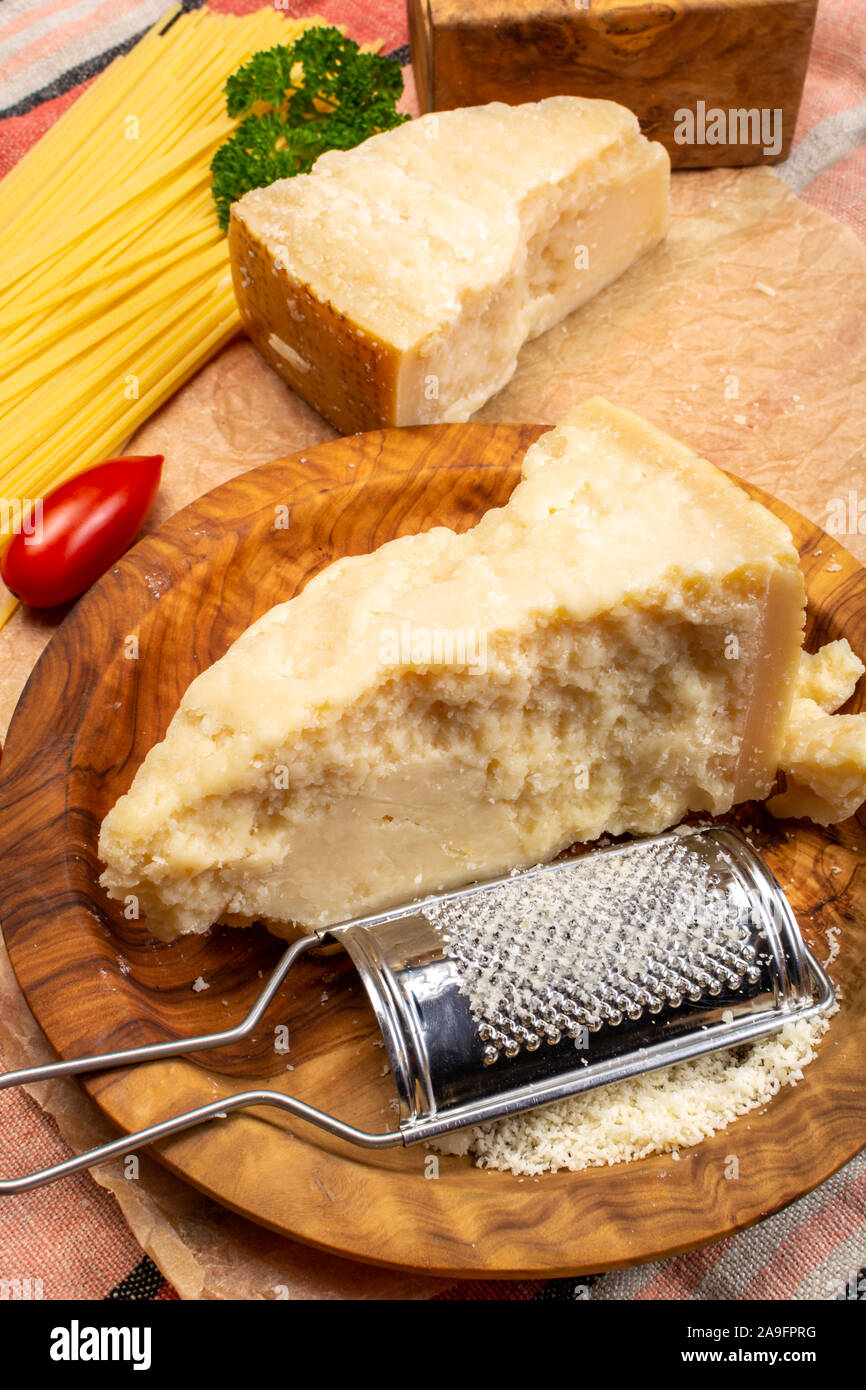 Cooking with hard italian cheese, grated parmesan or grana padano ...