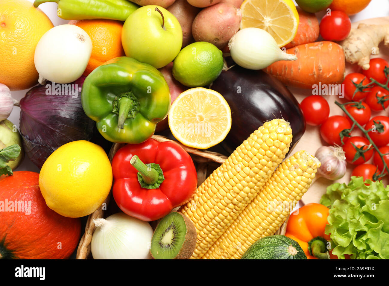 Vegetables and fruits texture on whole background, close up Stock Photo ...