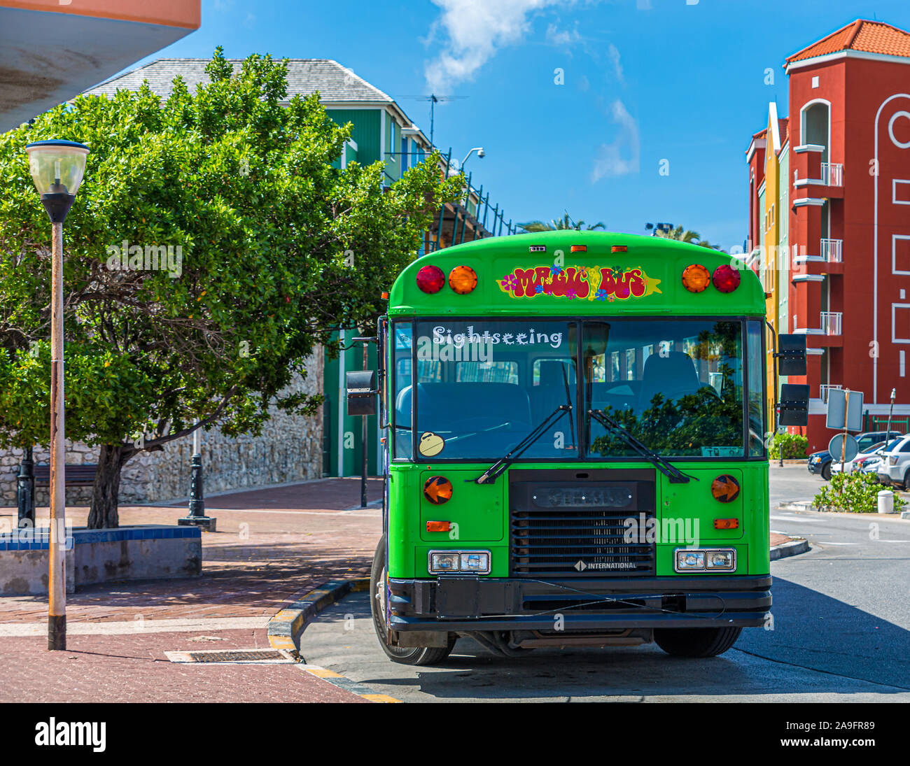 A sightseeing bus in Willemstad, Curacao waiting to start the work day ...