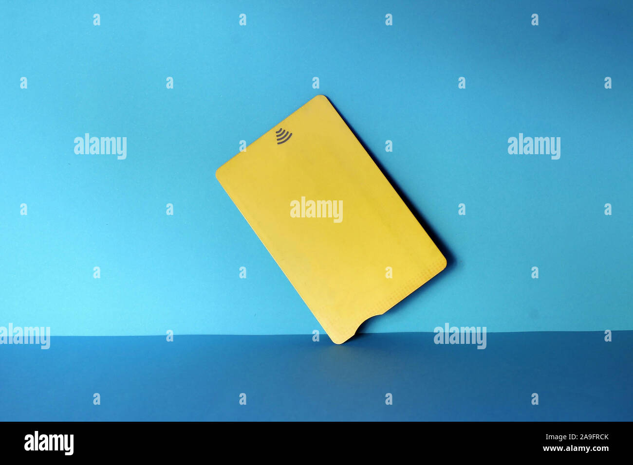 Yellow debit/credit target on a blue background. Card with Contactless ...