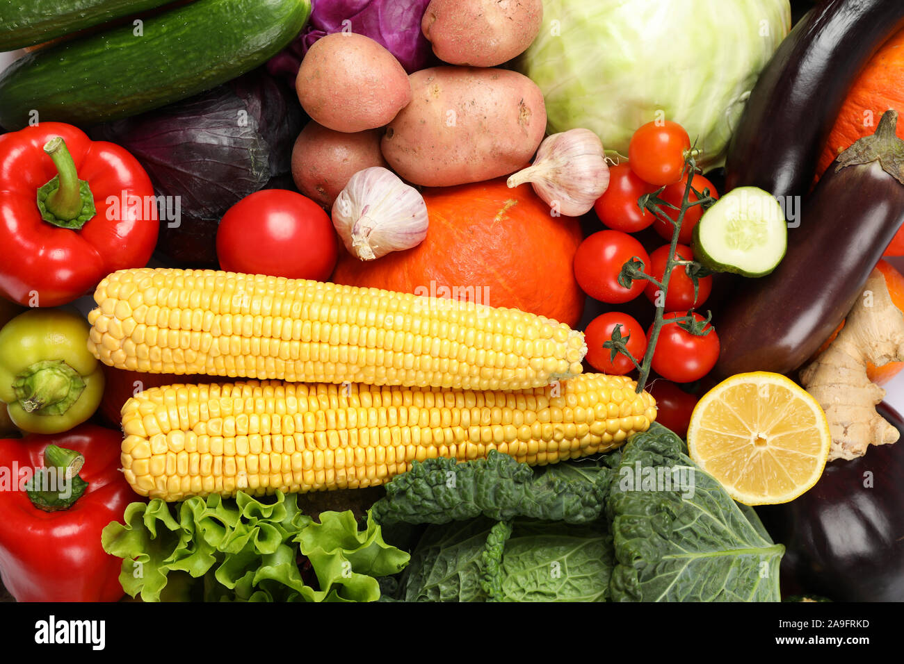 Vegetables and fruits texture on whole background, close up Stock Photo ...