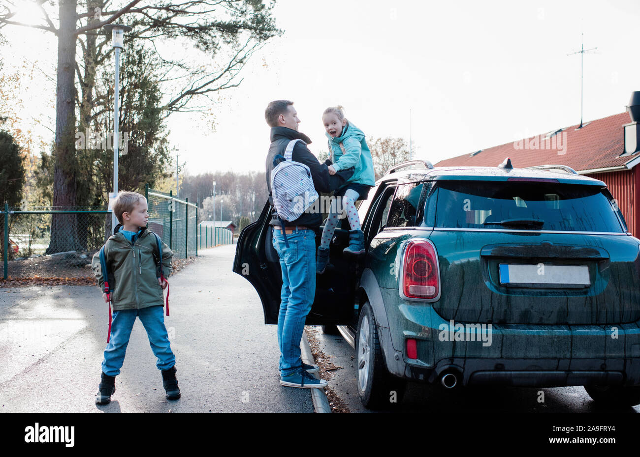 Parents Dropping Child High Resolution Stock Photography and Images - Alamy