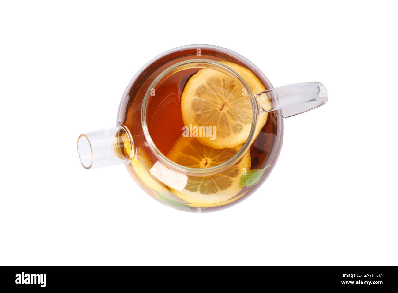 Glass teapot with lemon slices isolated on white background Stock Photo ...