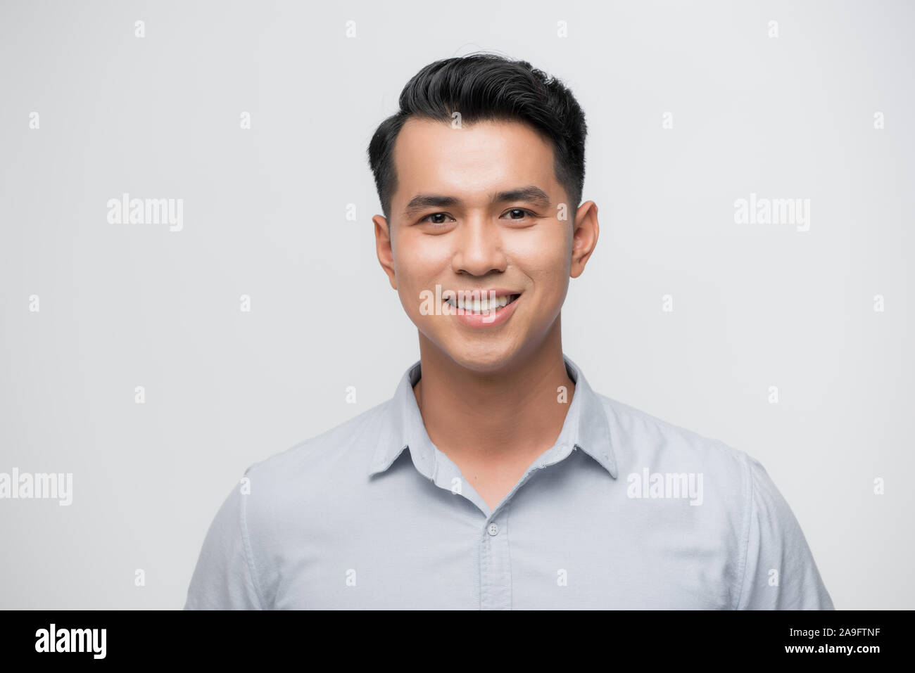 Attractive young asian man good hi-res stock photography and images - Alamy