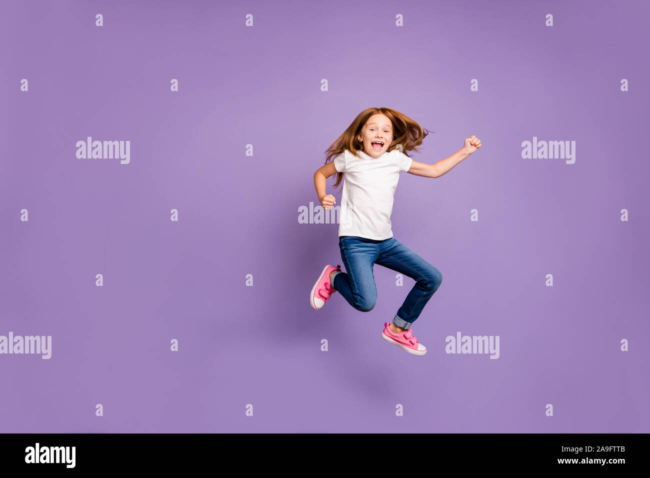 Full length photo of funny small foxy lady jumping high spending free ...