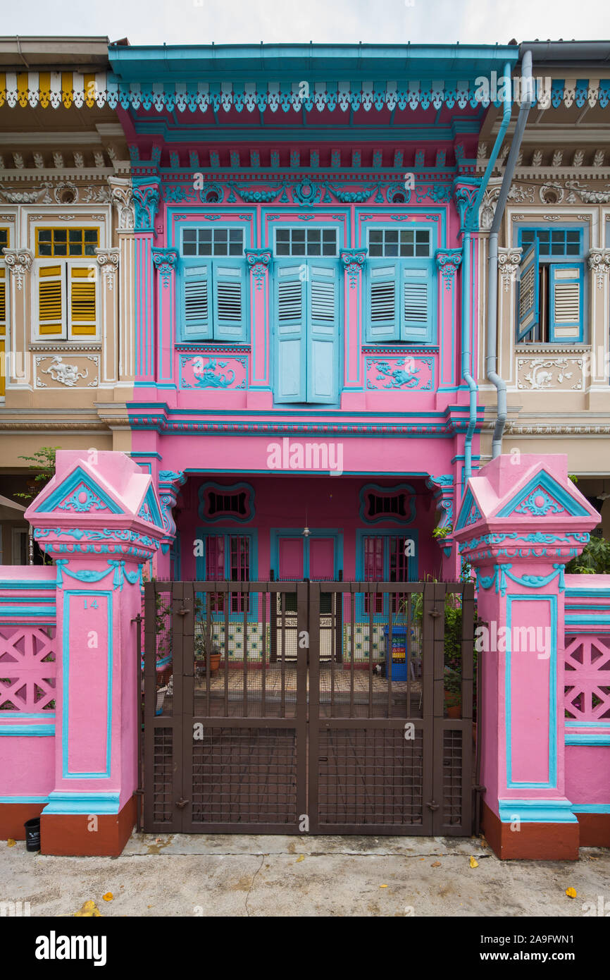 Architecture of two storey conserved Peranakan shophouse, painted in ...