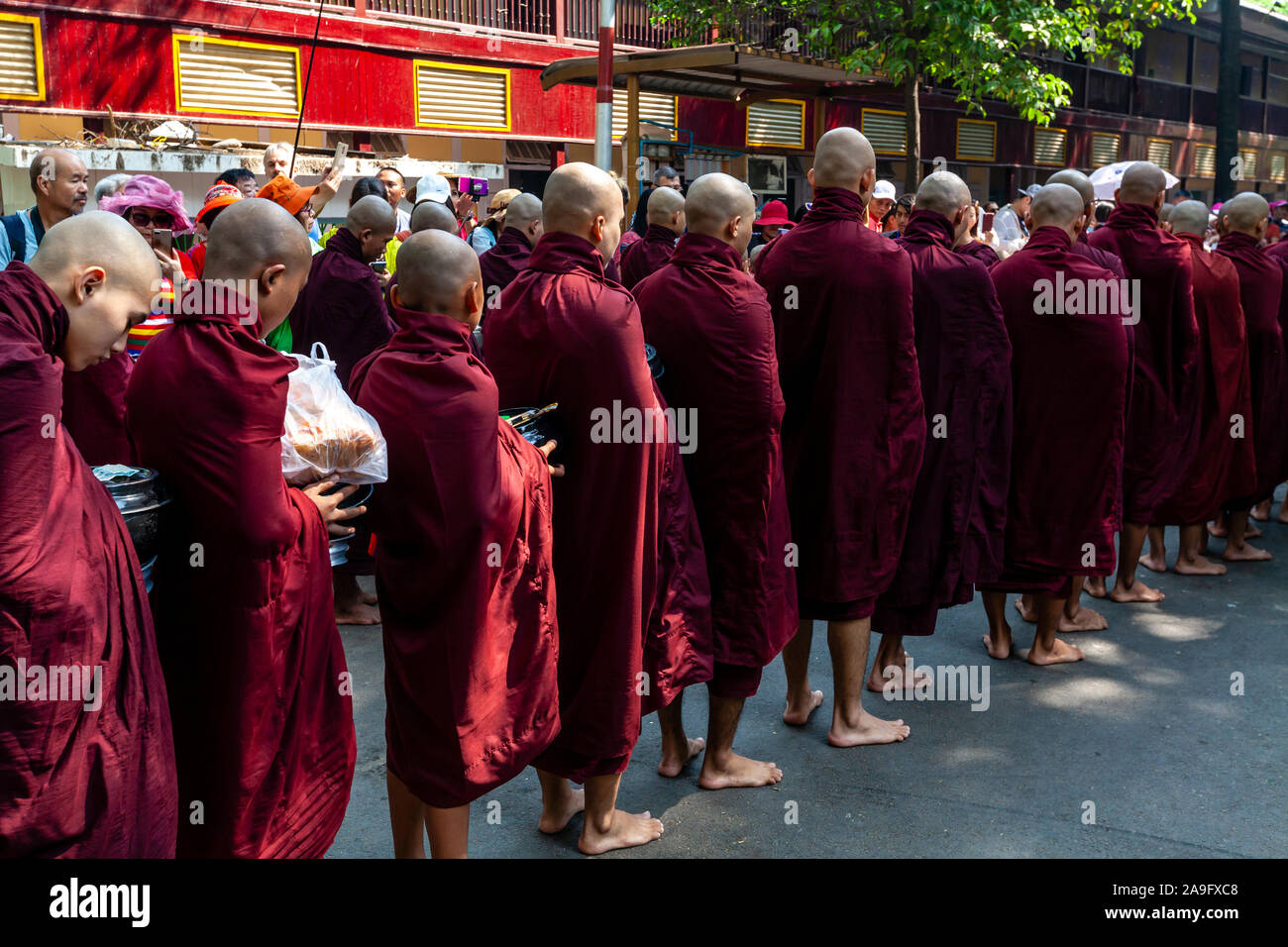 Procession buddhist monks walking hi-res stock photography and images ...