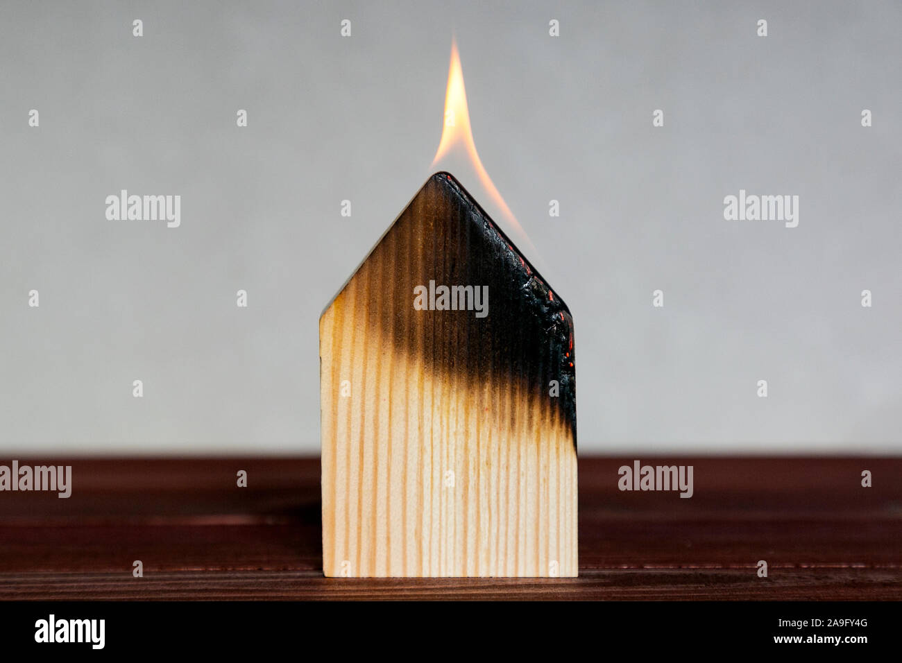 Burnt wooden board with coals blackened by fire Stock Photo - Alamy