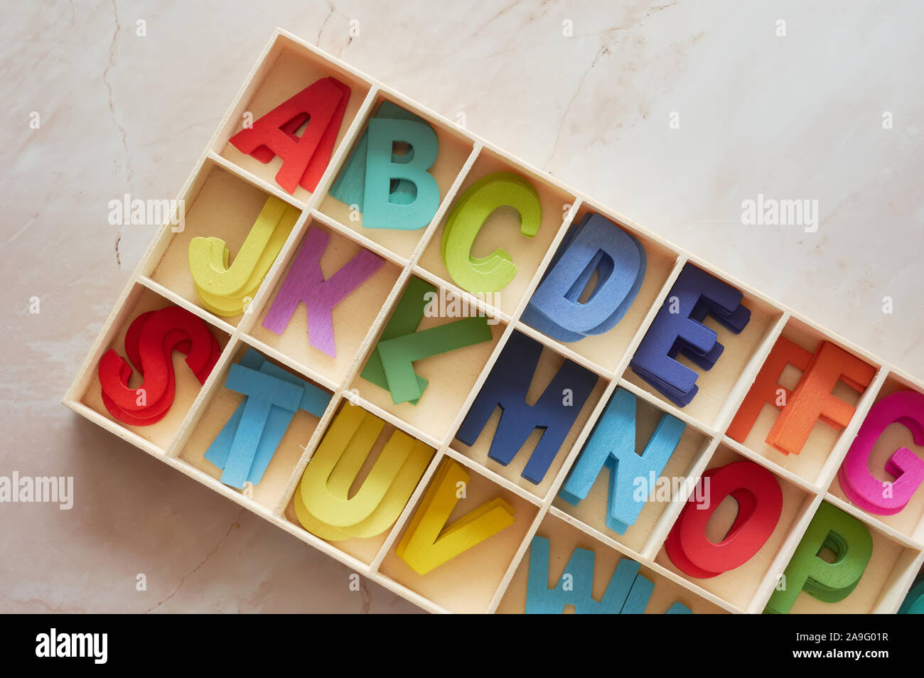 The colorful wooden alphabet toy Stock Photo - Alamy