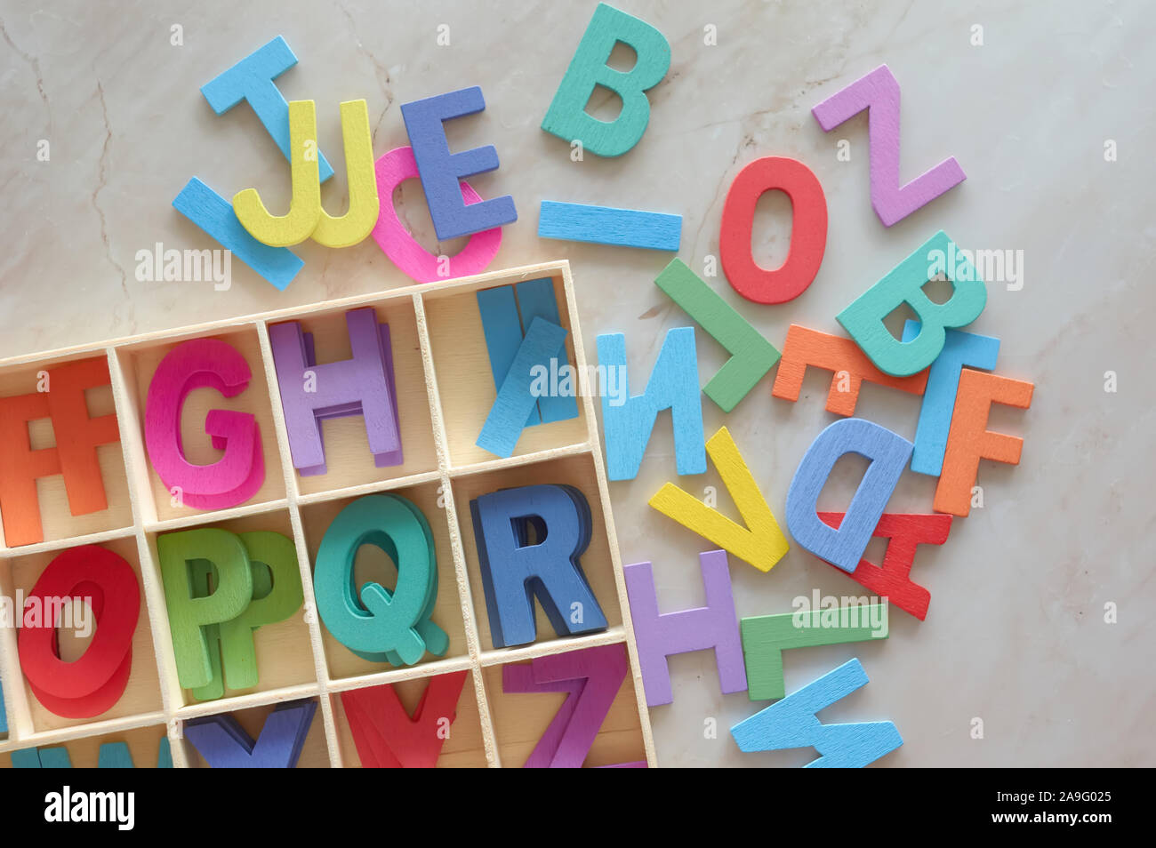 The colorful wooden alphabet toy Stock Photo - Alamy