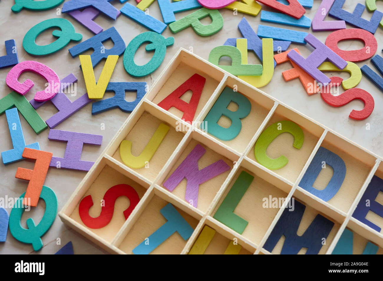 The colorful wooden alphabet toy Stock Photo - Alamy
