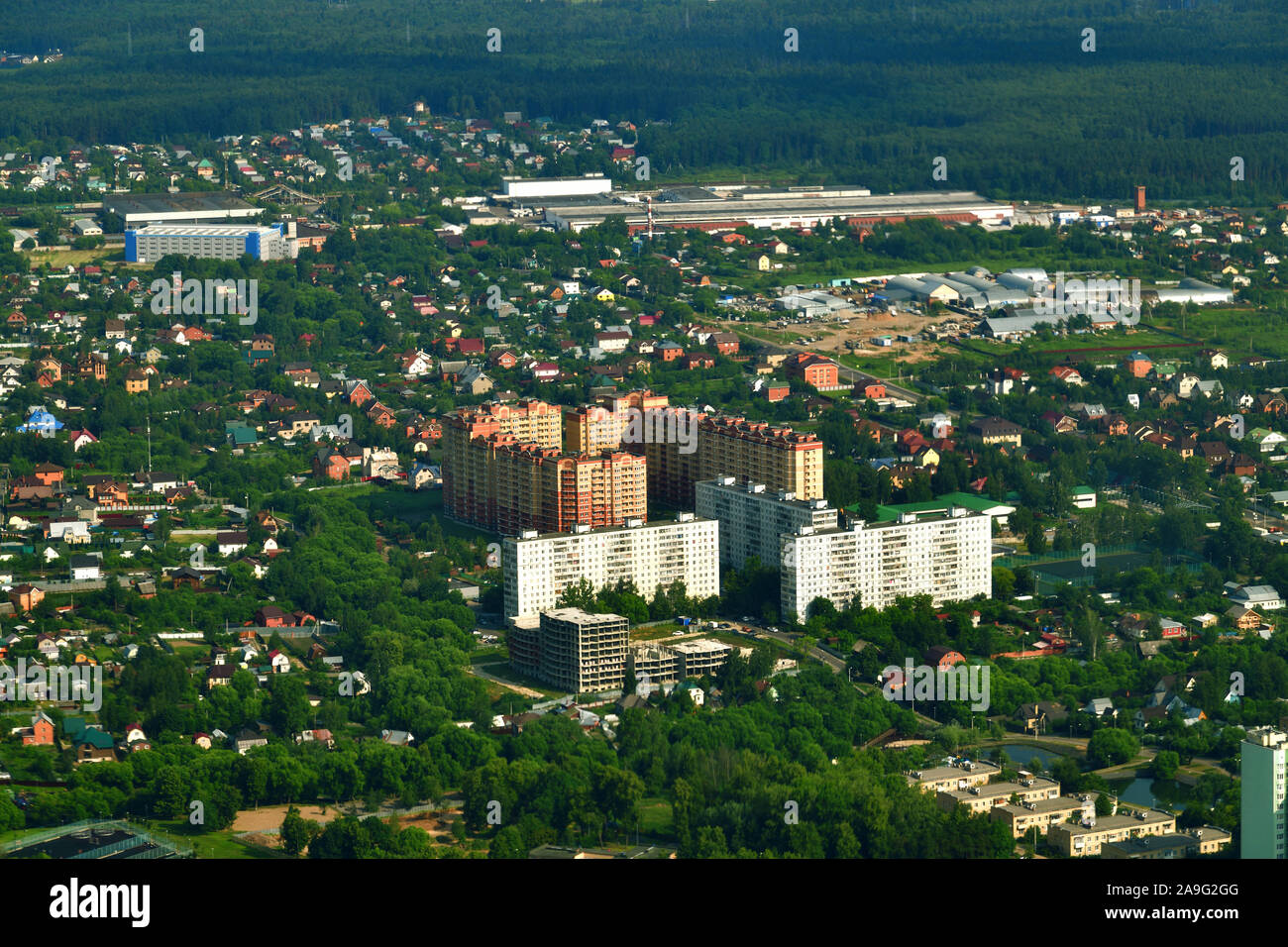 Top view in the suburbs - multi-storey and rural houses Stock Photo - Alamy